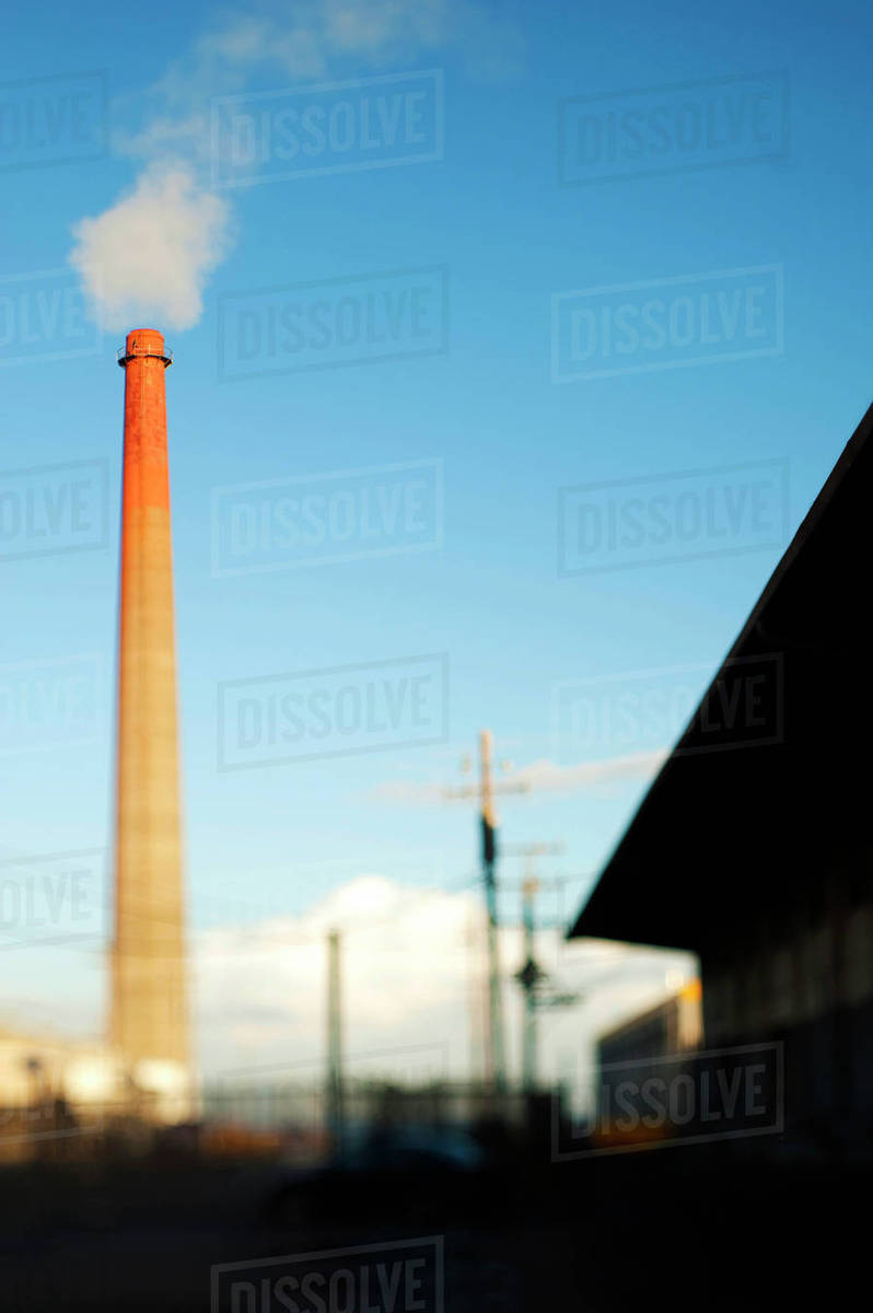 Smokestack and Factory - Royalty-free Stock Photo | Dissolve