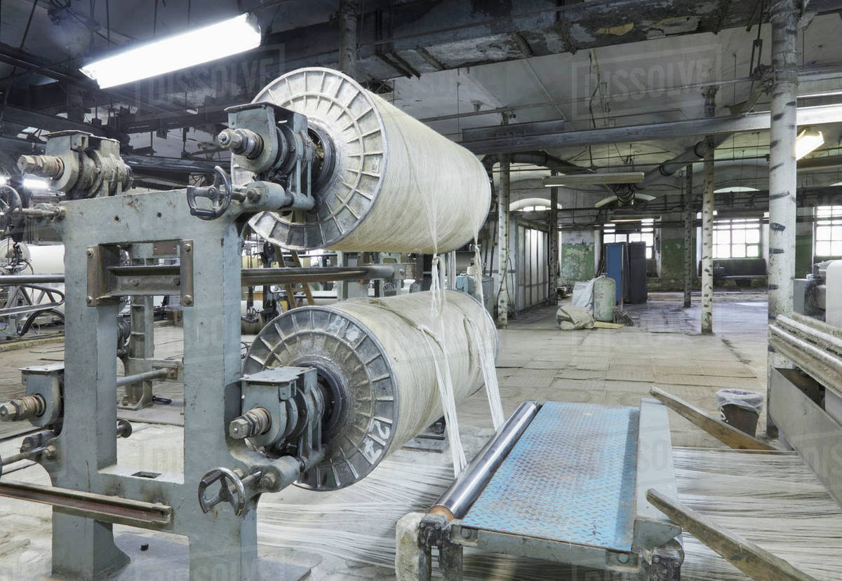 Industrial loom in textile factory - Royalty-free Stock Photo | Dissolve