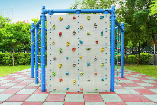 Climbing wall at playground - Stock Photo - Dissolve