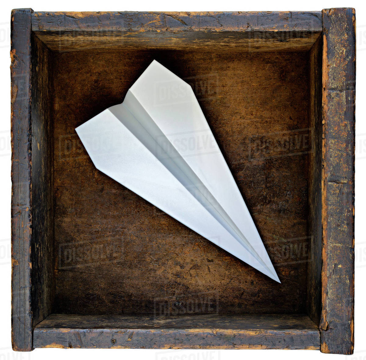 Paper airplane in wooden box - Royalty-free Stock Photo | Dissolve