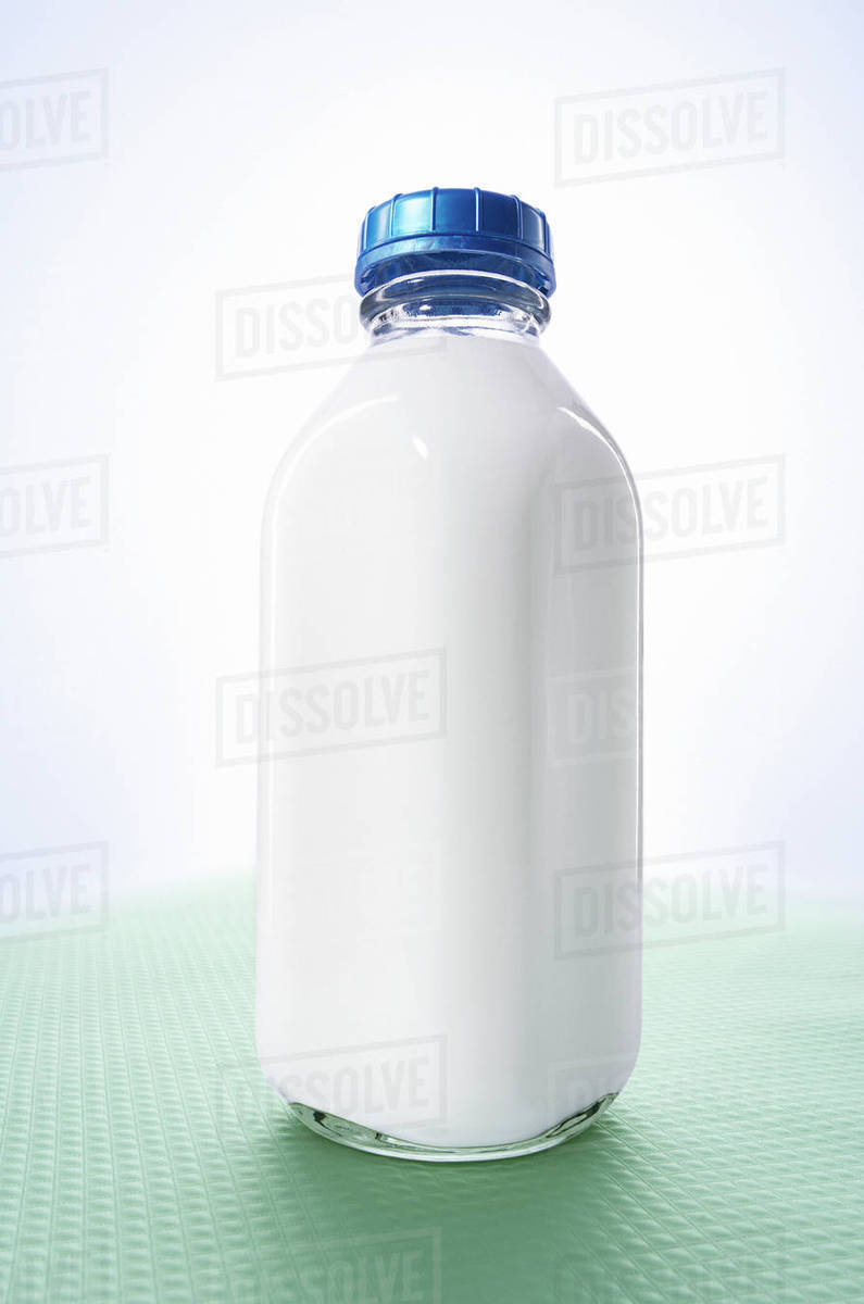Close up of bottle of milk - Stock Photo - Dissolve