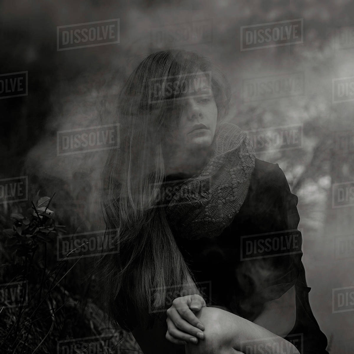 Caucasian woman in fog outdoors - Royalty-free Stock Photo | Dissolve