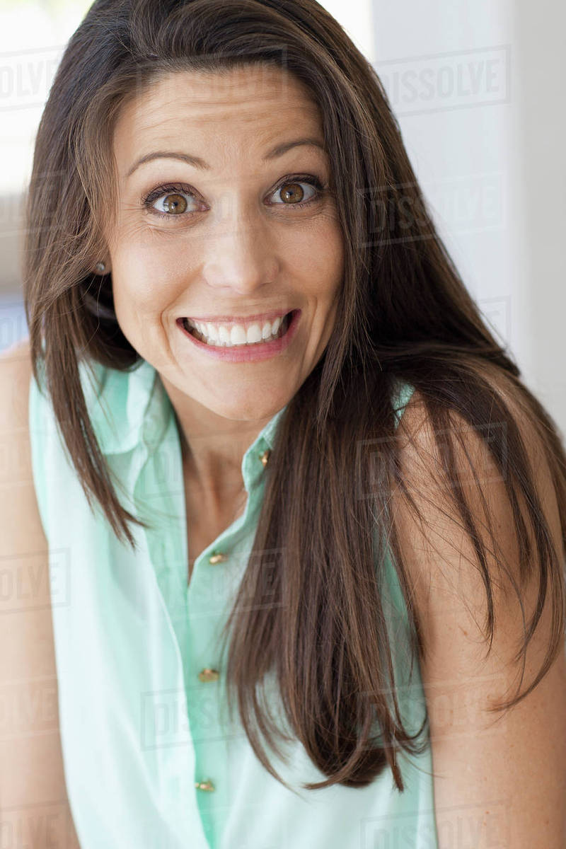 Surprised Caucasian woman shrugging - Royalty-free Stock Photo | Dissolve