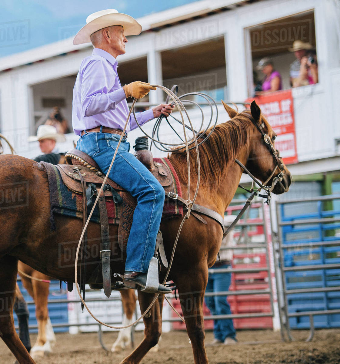 Caucasian cowboy riding horse in rodeo - Royalty-free Stock Photo ...