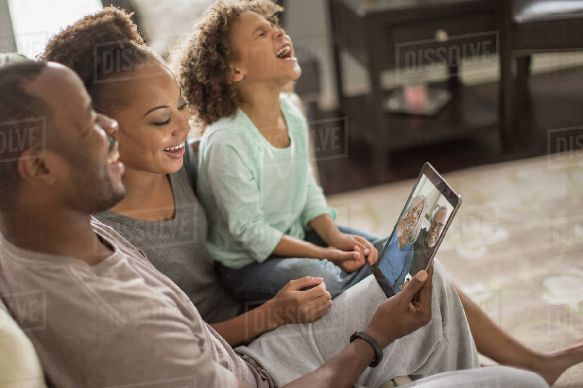 Family video chatting with digital tablet - Royalty-free Stock Photo ...