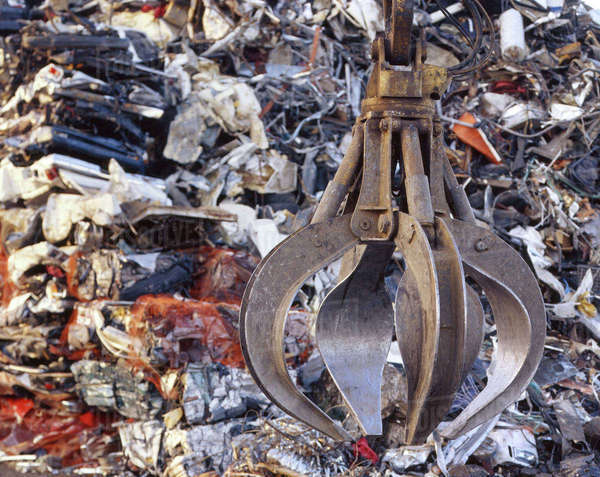 Mechanical grabber in junkyard at night - Royalty-free Stock Photo ...