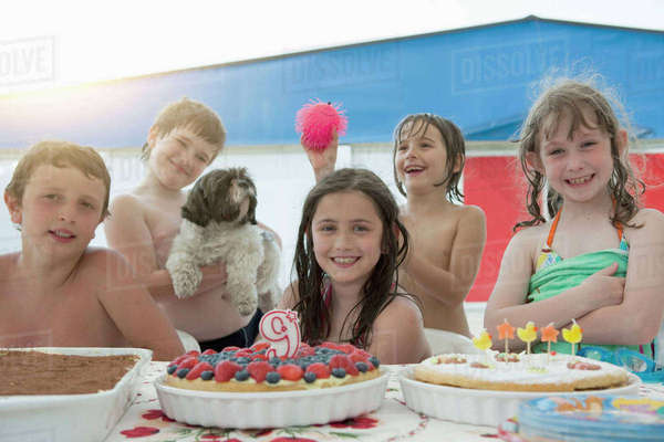 Smiling Caucasian children posing at birthday party - Royalty-free ...