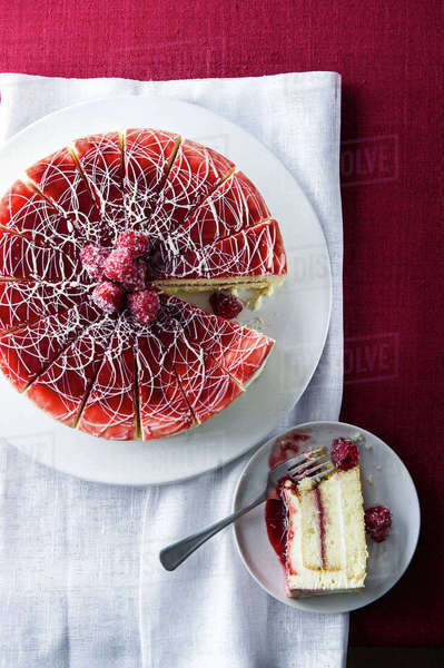 Limoncello raspberry cake on plate and tray - Stock Photo - Dissolve