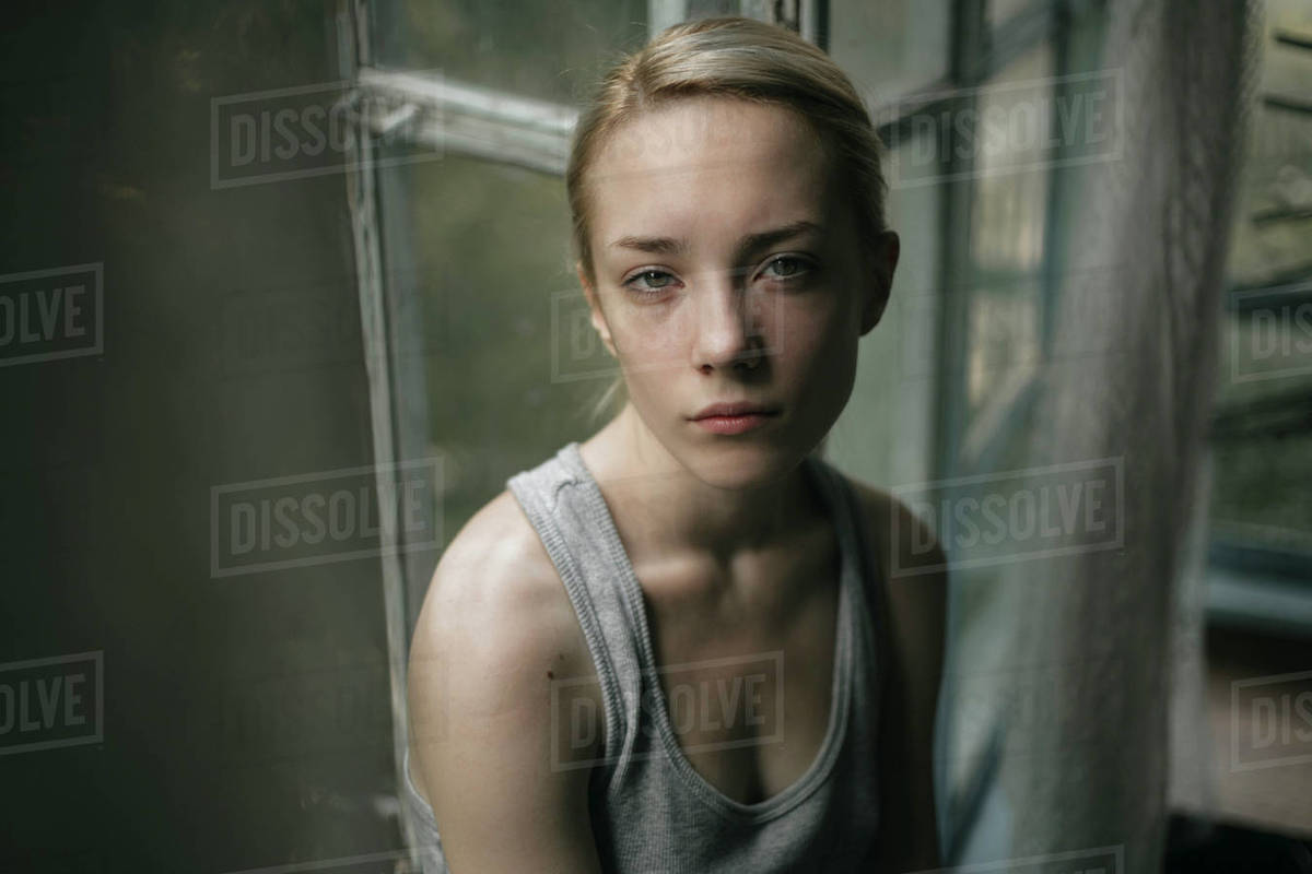 Portrait of serious woman - Royalty-free Stock Photo | Dissolve