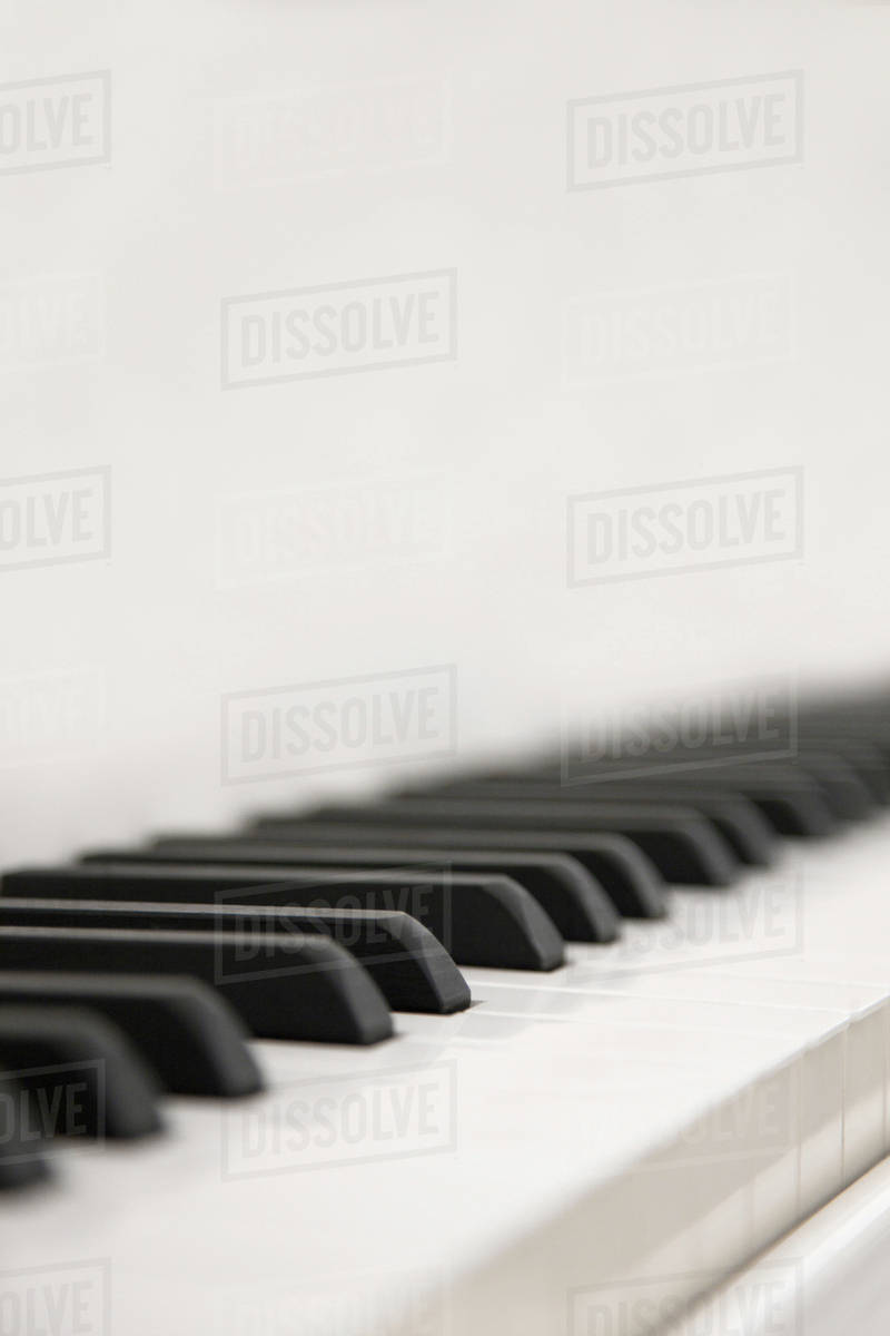 Close up of piano keys - Stock Photo - Dissolve