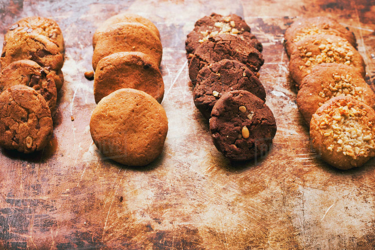 Variety of cookies in rows - Stock Photo - Dissolve