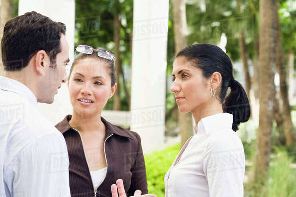 Business people talking outdoors - Royalty-free Stock Photo | Dissolve