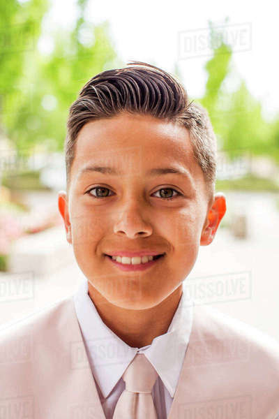 Portrait of smiling Hispanic boy - Royalty-free Stock Photo | Dissolve