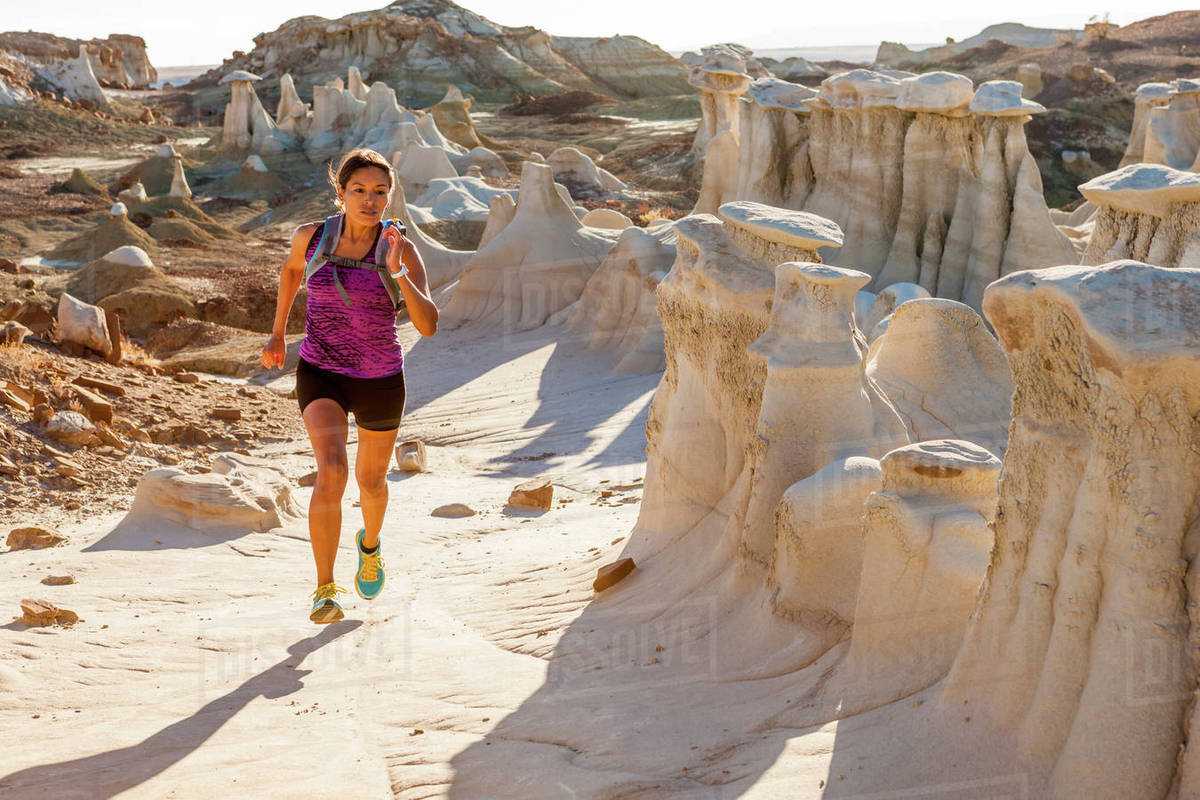 Native American woman running in desert - Royalty-free Stock Photo ...