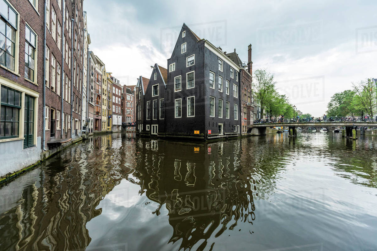 Reflection of buildings in urban canal - Royalty-free Stock Photo ...