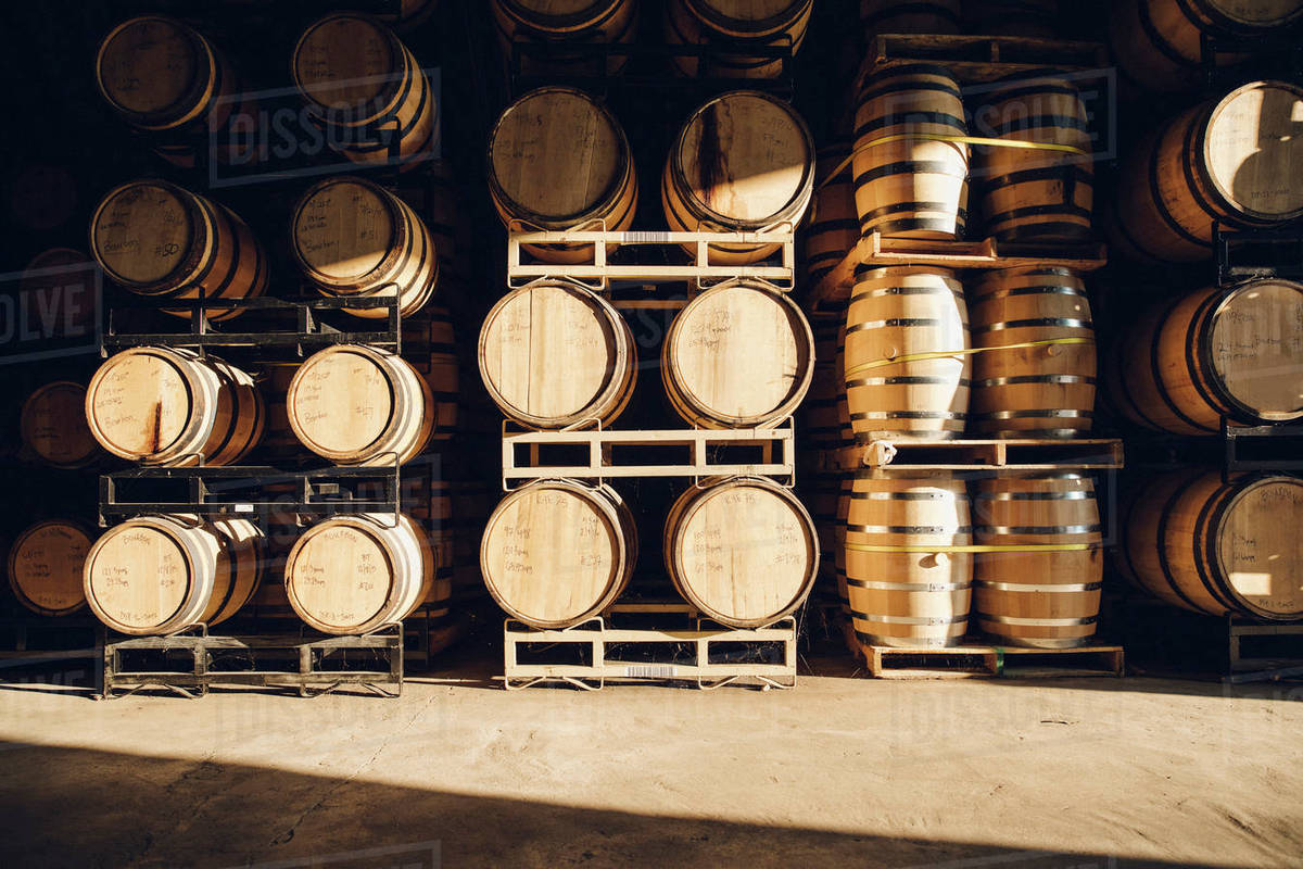 Barrels in distillery - Royalty-free Stock Photo | Dissolve