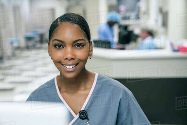 Portrait of smiling nurse - Royalty-free Stock Photo | Dissolve