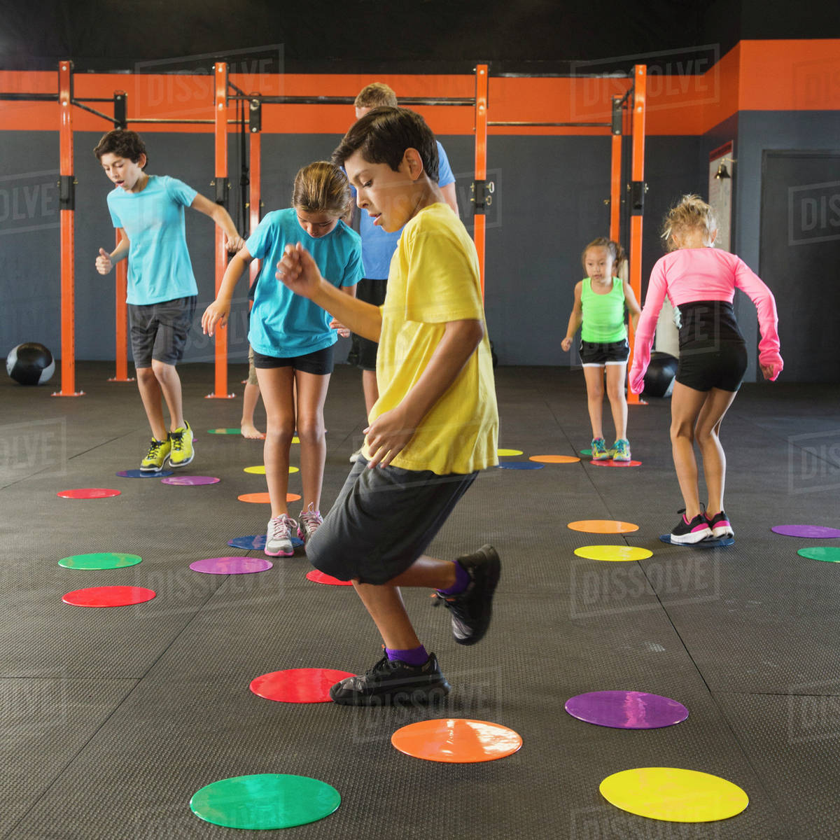 Children training in gym - Stock Photo - Dissolve