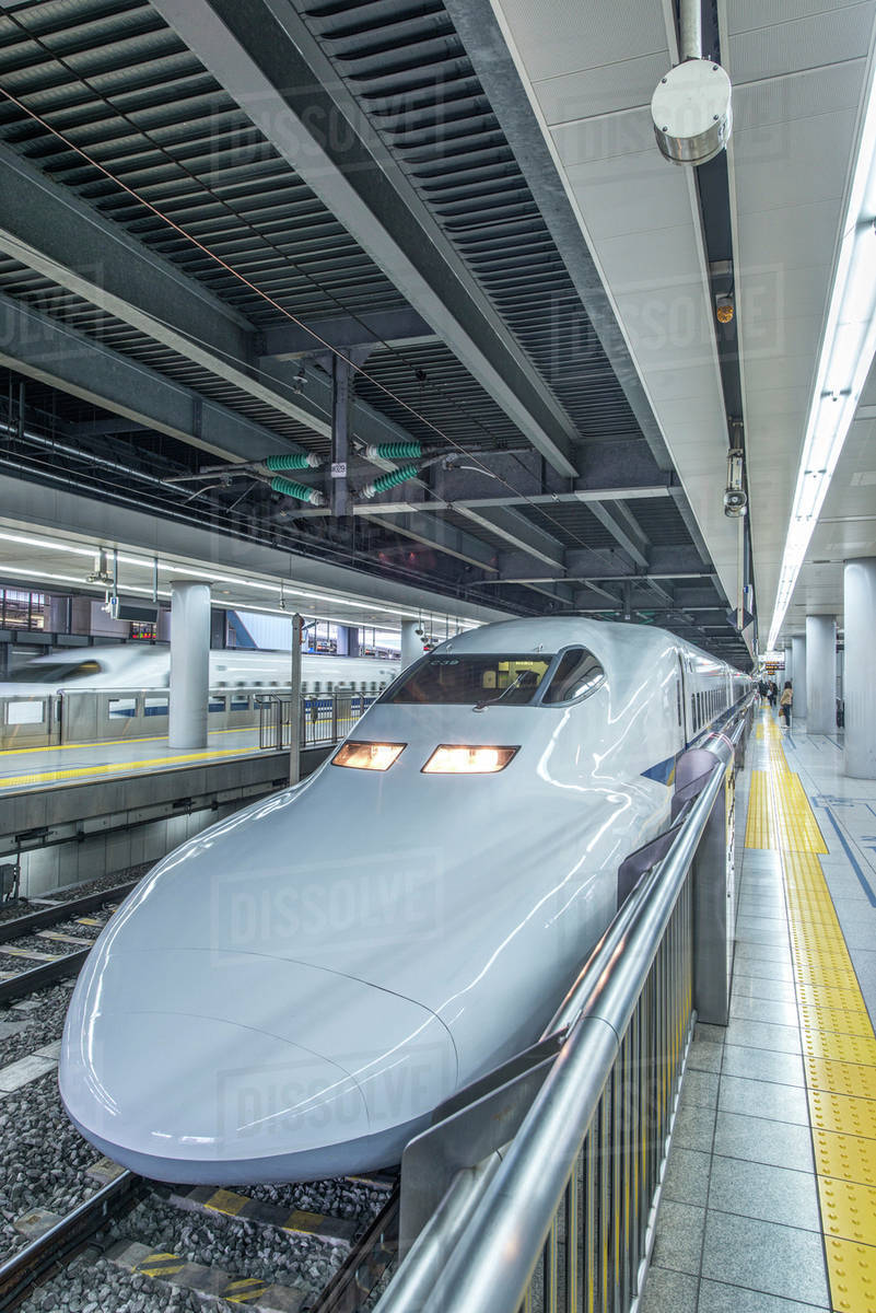 High speed trains in station, Tokyo, Japan - Stock Photo - Dissolve