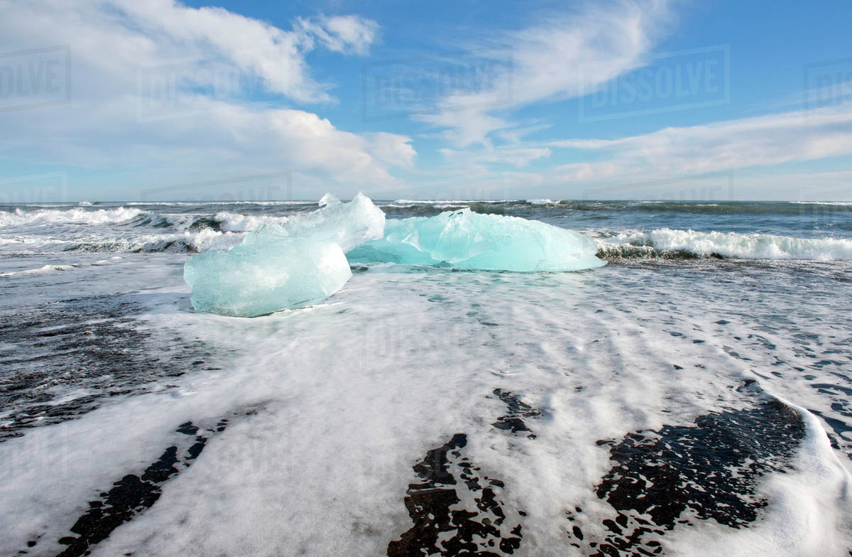 Glaciers melting on arctic beach - Royalty-free Stock Photo | Dissolve