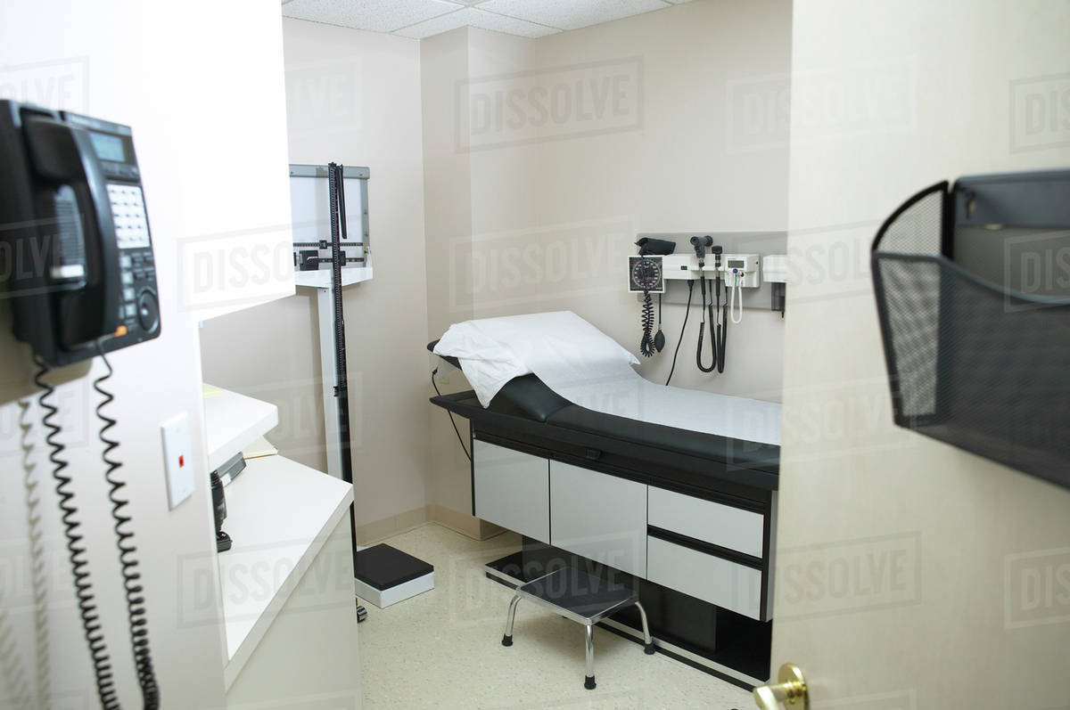 Table, scales and phone in doctor's office - Royalty-free Stock Photo ...