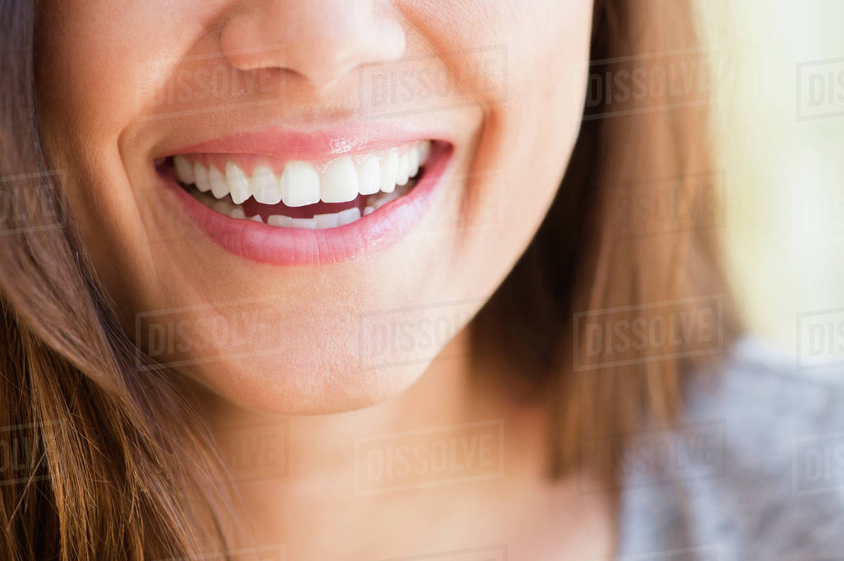 Close up of woman's smile - Royalty-free Stock Photo | Dissolve