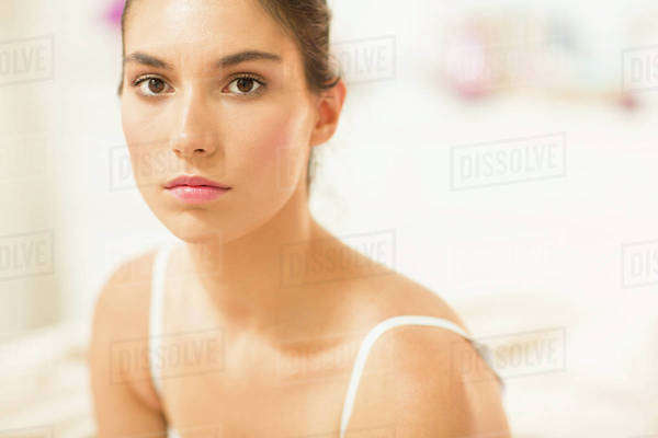 Caucasian woman frowning - Royalty-free Stock Photo | Dissolve