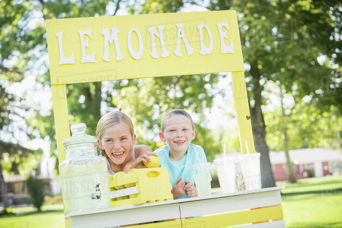 Caucasian brother and sister smiling at lemonade stand - Royalty-free ...