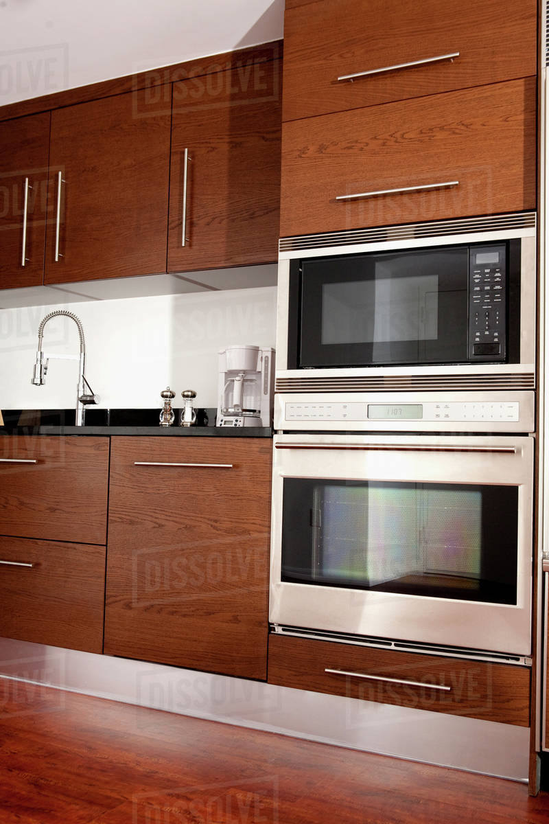 Oven, microwave and sink in modern kitchen - Royalty-free Stock Photo ...