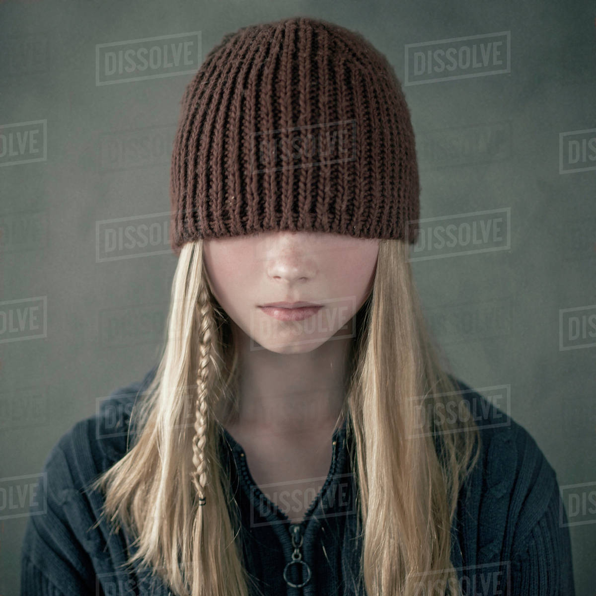 Teenage girl wearing knitted cap over eyes - Royalty-free Stock Photo ...