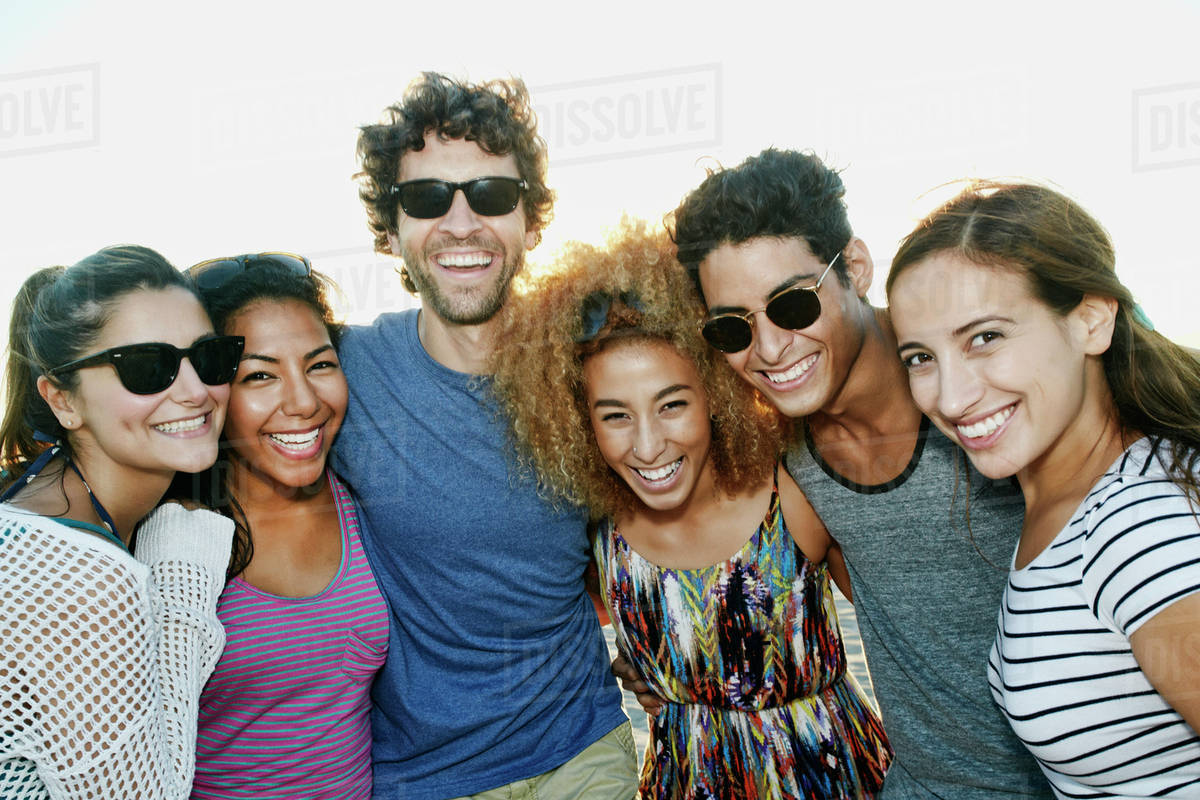 Smiling friends posing together outdoors - Royalty-free Stock Photo ...