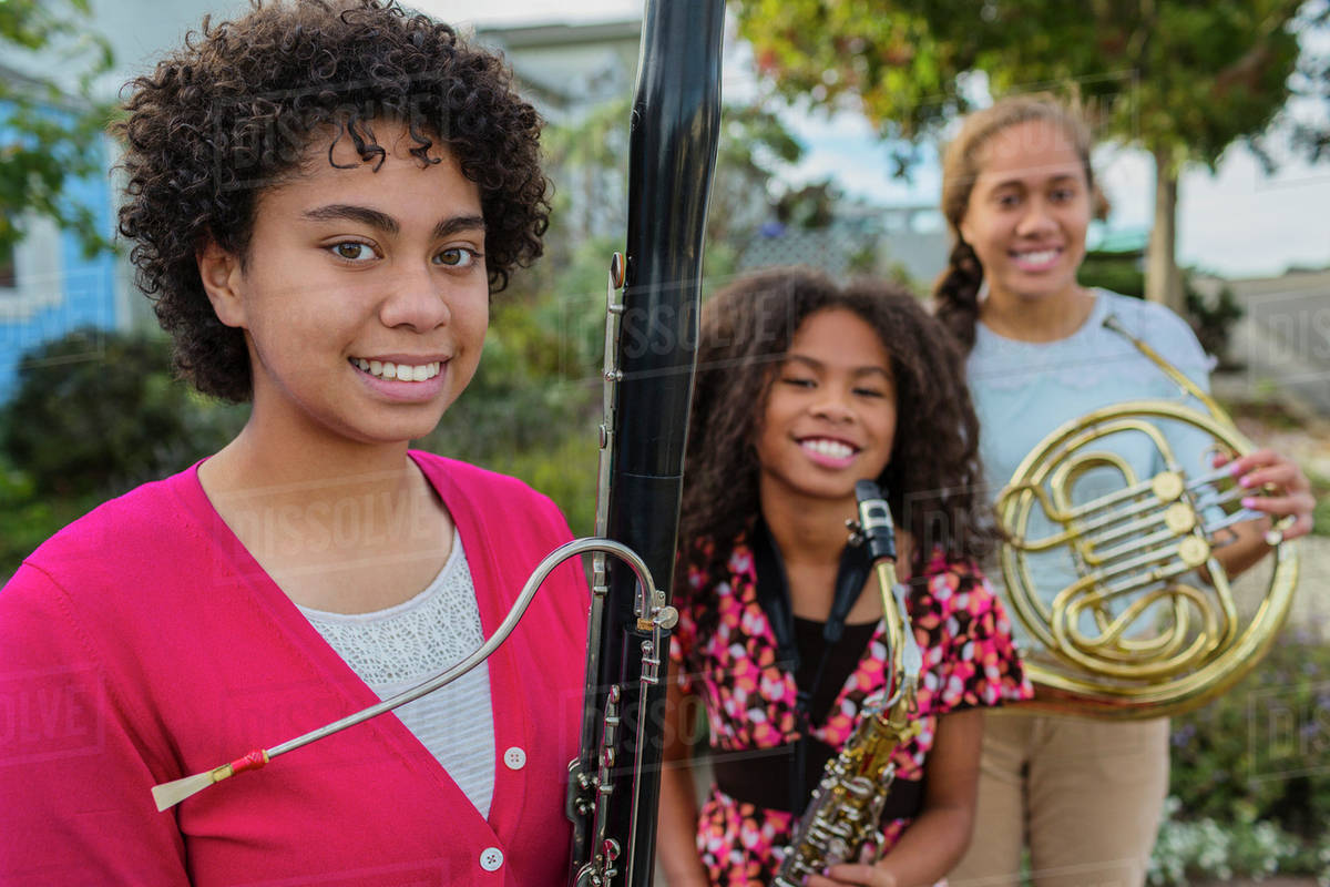 Pacific Islander girls holding musical instruments - Royalty-free Stock ...