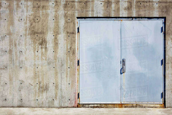 Double doors of a warehouse or storage unit - Stock Photo - Dissolve