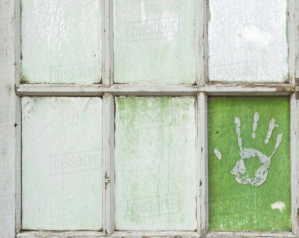 Hand Print on a Greenhouse Windowpane - Royalty-free Stock Photo | Dissolve