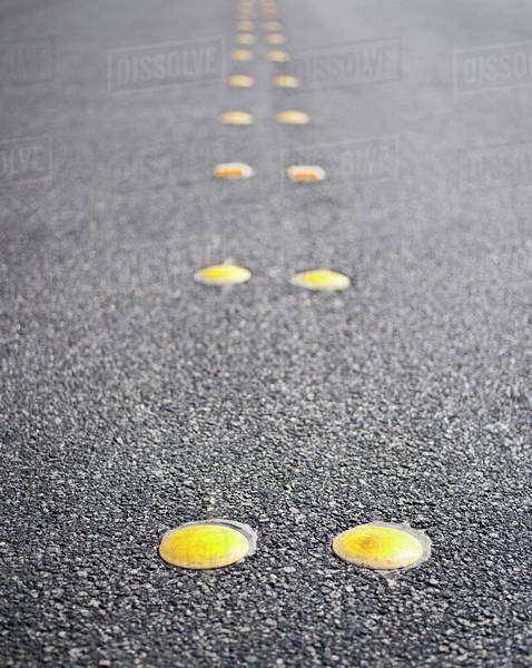 Reflective Roadway Divider Bumps - Royalty-free Stock Photo | Dissolve