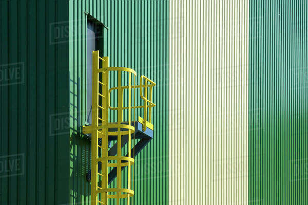 Yellow staircase of an emergency exit and fire escape steps - Royalty ...