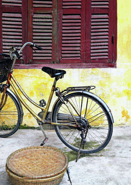 Bicycle Outside an Old Home - Stock Photo - Dissolve