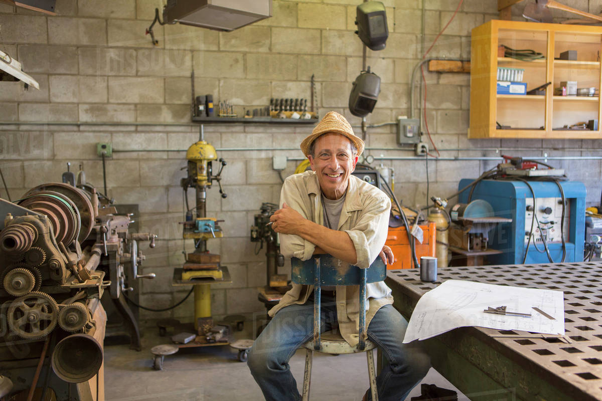 Middle Eastern man working in workshop - Royalty-free Stock Photo ...
