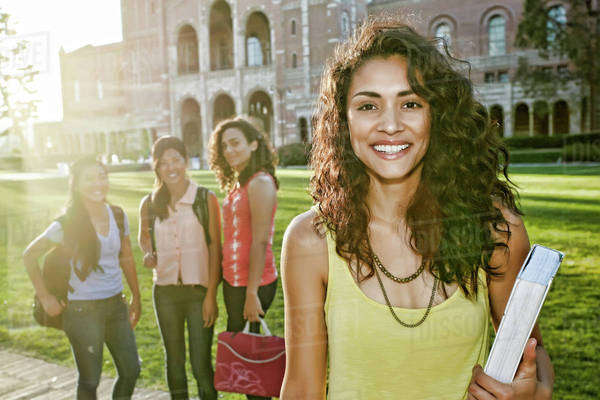 Student smiling on campus - Royalty-free Stock Photo | Dissolve