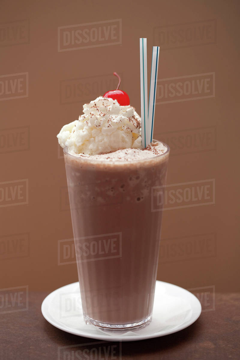 Close up of chocolate milkshake - Royalty-free Stock Photo | Dissolve