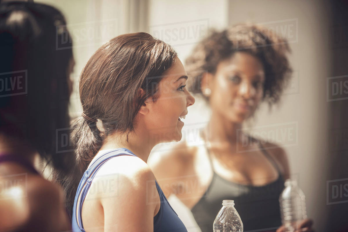 Women talking in gym - Royalty-free Stock Photo | Dissolve