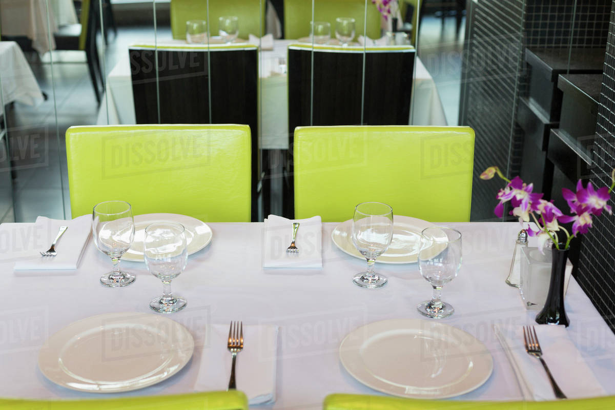 Set tables in Thai restaurant - Royalty-free Stock Photo | Dissolve