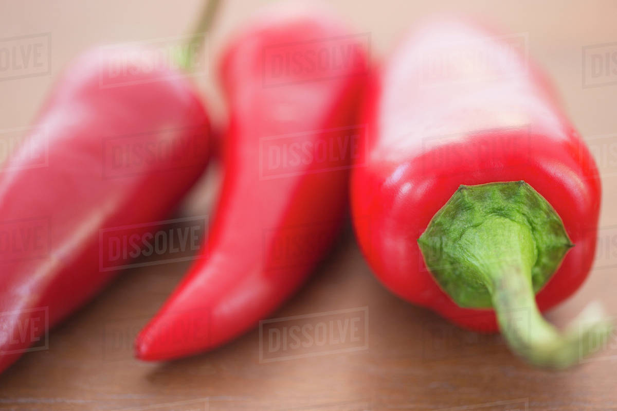 Close up of red chili peppers - Royalty-free Stock Photo | Dissolve