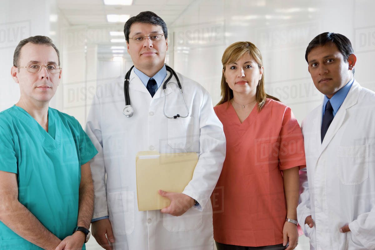 Hispanic doctors in hospital - Royalty-free Stock Photo | Dissolve