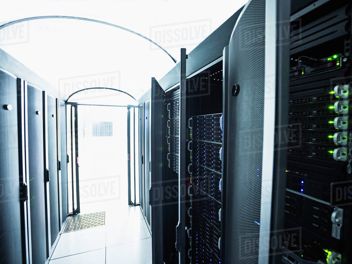 Cabinets and technology in server room - Stock Photo - Dissolve