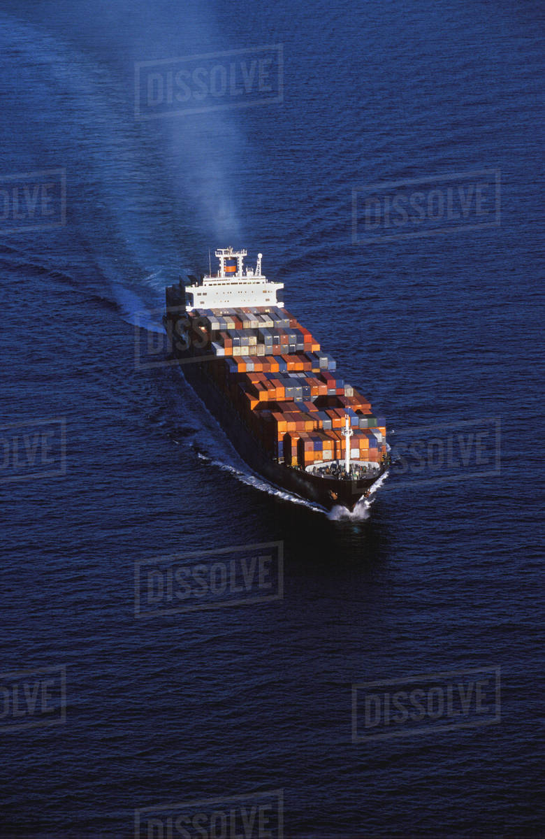 Aerial view of shipping barge sailing on ocean - Royalty-free Stock ...