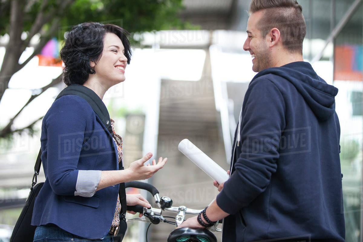 Caucasian business people talking outside office - Royalty-free Stock ...