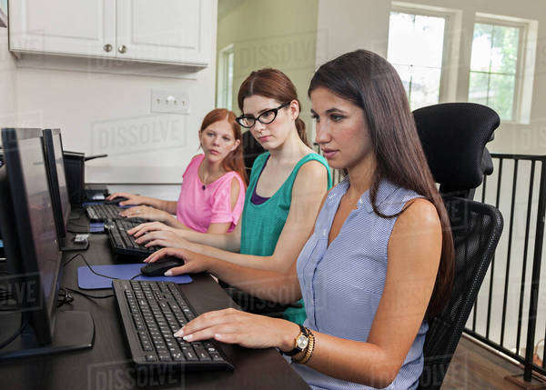 Women using computers - Royalty-free Stock Photo | Dissolve