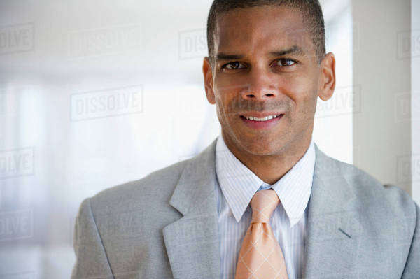 Serious mixed race businessman - Royalty-free Stock Photo | Dissolve