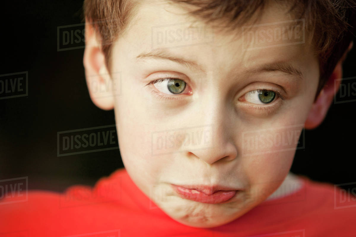 Pouting Caucasian boy - Royalty-free Stock Photo | Dissolve